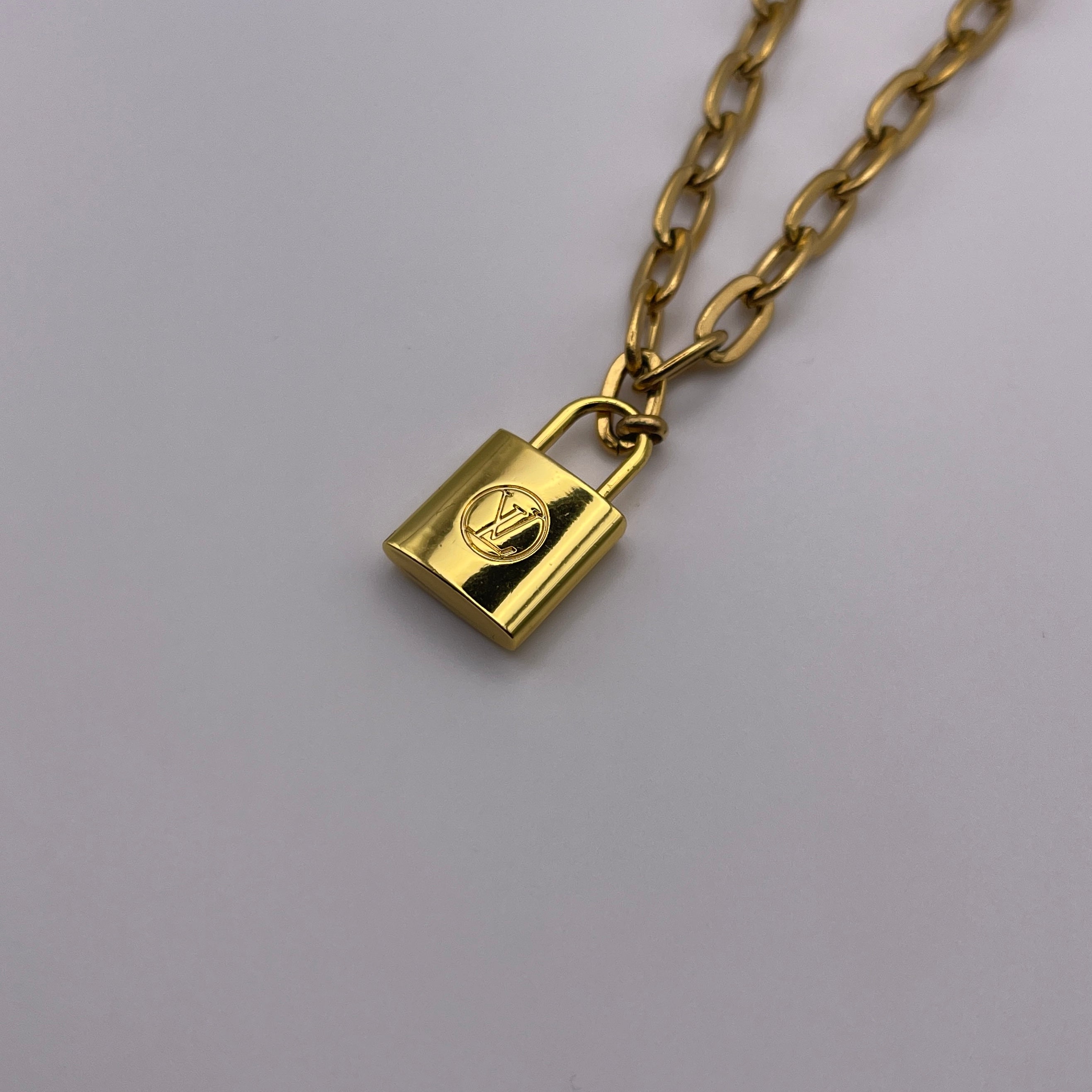 MABEL | reworked lv lock necklace in malta – Adira Label